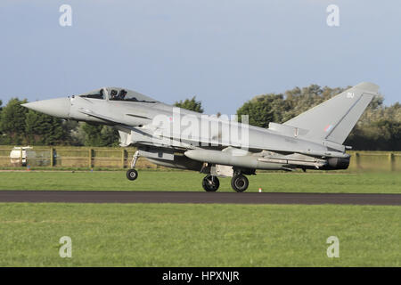 RAF Typhoon fighter jet rolling into inverted position with full ...