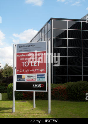Estate agents industrial warehouse units to let sign Stock Photo - Alamy