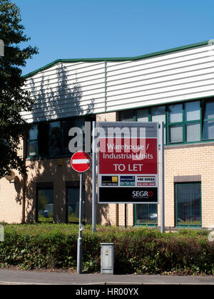 Estate agents industrial warehouse units to let sign Stock Photo - Alamy