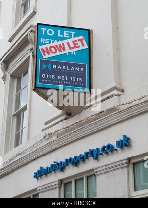 First floor offices to let sign over retail premises with now let ...