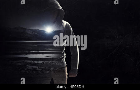 Spooky criminal person . Mixed media Stock Photo - Alamy