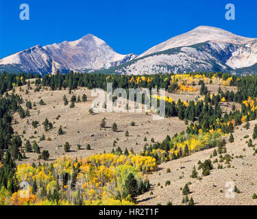Mountains in east Montana with golden autumn leaves and a light fog ...
