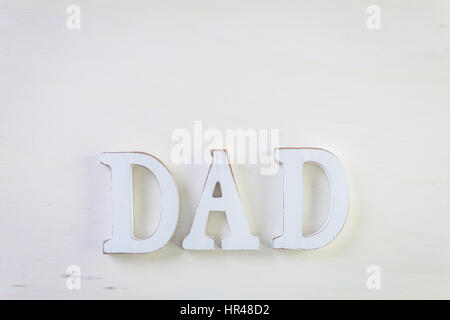 White letters DAD on a painted wood background Stock Photo - Alamy