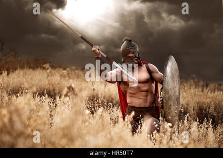 Fearless soldier. Sepia toned shot of a muscular powerful Roman soldier ...