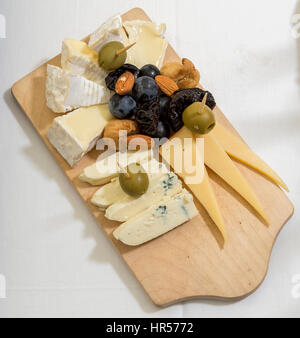 Cheese platters with grapes bread wooden desk Stock Photo - Alamy