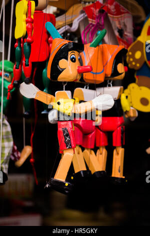 Set of wodden puppet Pinocchio in outdoor bazaar Stock Photo - Alamy