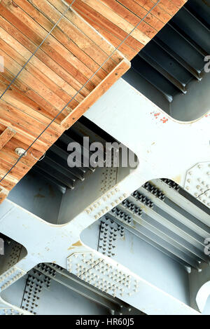 Underneath structure of bridge framework Stock Photo - Alamy