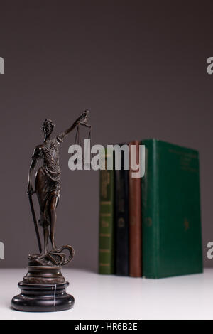 Themis with scale, symbol of justice on USA flag background composition ...