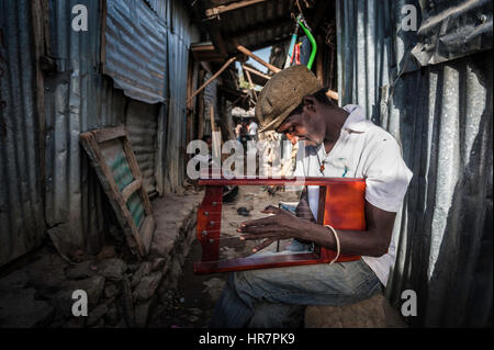 Man playing traditional Ethiopian instrument masenqo Stock Photo - Alamy