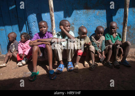 Orphans sitting outside orphanage, Kibera slum, Nairobi, Kenya, East ...