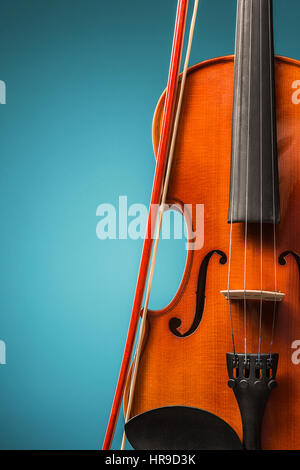 Violin front view on blue studio background Stock Photo - Alamy