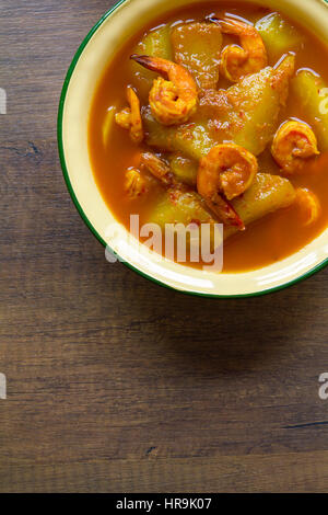 Southern Thai style Kaeng Som. A spicy and sour curry food in a bowl ...