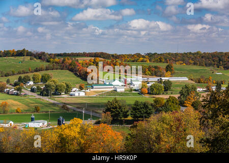 Amish farms in a valley with fall foliage color near Walnut Creek, Ohio ...
