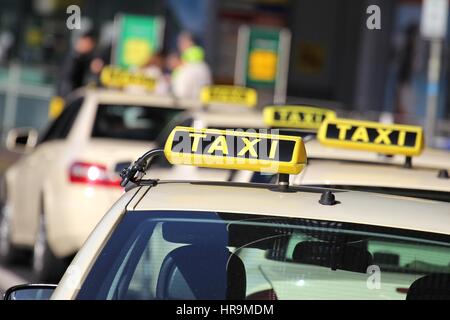 German taxi cabs waiting for passengers Stock Photo - Alamy