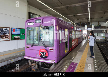 The purple train of the Keifuku Randen Tram Line in Kyoto, Japan Stock ...