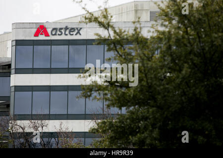 A logo sign outside of the headquarters of Astex Pharmaceuticals in ...