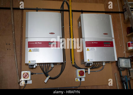 Two wall mounted Fronius IG inverters converting DC electricity from PV ...