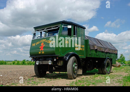 1933 Sentinel S4 Steam Waggon in a country road by cottages in ...