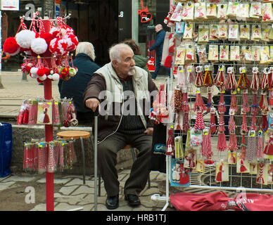 Traditional Bulgarian Martenitsa made of red and white wool, a symbol ...