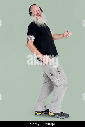 Bearded rocker guy playing air guitar portrait Stock Photo - Alamy
