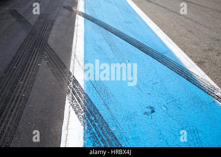 tyre marks on race track Stock Photo - Alamy