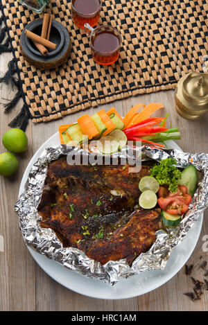 grilled arab fish Stock Photo - Alamy