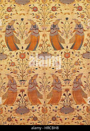 This brocade textile features intricate patterns and fine craftsmanship ...