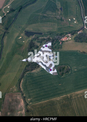 Avro Vulcan flying over the English countryside during an air-to-air ...