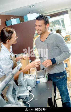 Client being served Stock Photo - Alamy