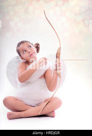 Girl disguised as Angel Stock Photo - Alamy