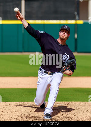 Detroit Tigers pitcher Mark Lowe walks to the mound after giving up a ...