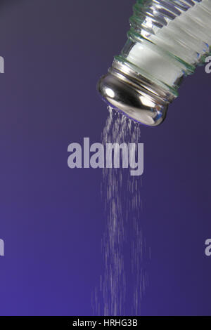 Salt Pouring out of Salt Shaker Stock Photo - Alamy