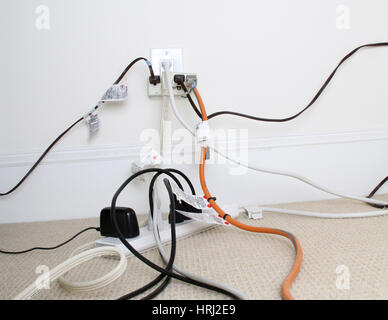 Fire in overloaded power strip isolated white background Stock Photo ...