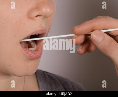 Swabbing Cheek for DNA Stock Photo - Alamy