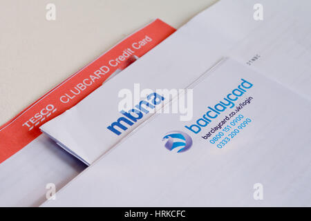 Stack of credit card statements including Tesco Bank, Barclaycard and ...