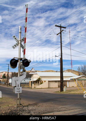Railroad crossing signal on city street Stock Photo - Alamy