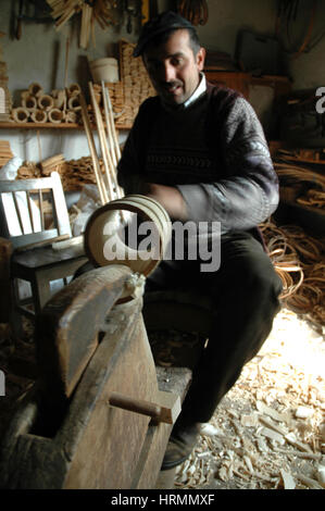 PATRAHAITESTI - CCA JUNE: Carpenter handcrafting a traditional Romanian ...