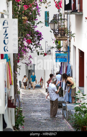 Exploring the narrow whitewashed streets of Cadaques, Costa Brava ...