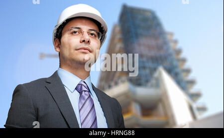 Construction site with excavator, architect and heavy truck Stock Photo ...