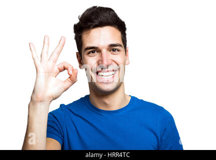 cool guy doing the ok sign with his hand - isolated over a white ...