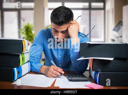 Man doing a boring job Stock Photo - Alamy