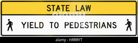 sign "State law, yield to pedestrians within crosswalk Stock Photo ...