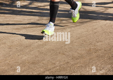 Senior athletic runner detail. Outdoor circuit. Horizontal Stock Photo ...