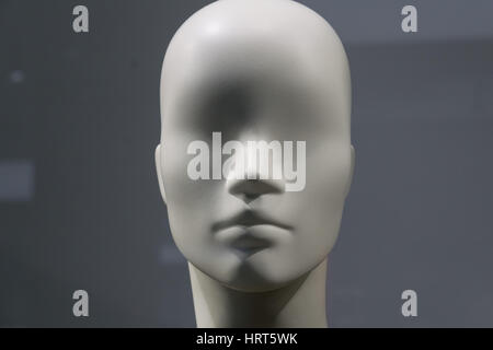 Smooth grey Mannequins in a shop window Stock Photo - Alamy