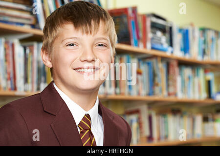 Classroom Portrait Of Smiling Male Elementary School Pupil In Art Class ...