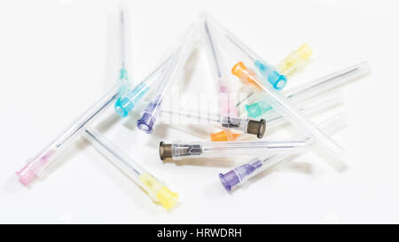 Colorful Needles put in needle sheath on white background Stock Photo ...