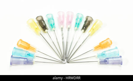 Colorful Needles put in needle sheath on white background Stock Photo ...