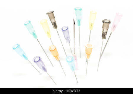 Colorful Needles put in needle sheath on white background Stock Photo ...