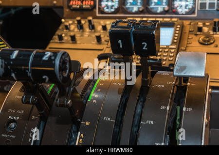 Center console and throttles in airplane Stock Photo - Alamy