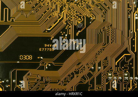 Electronic circuit plate background golden Stock Photo - Alamy